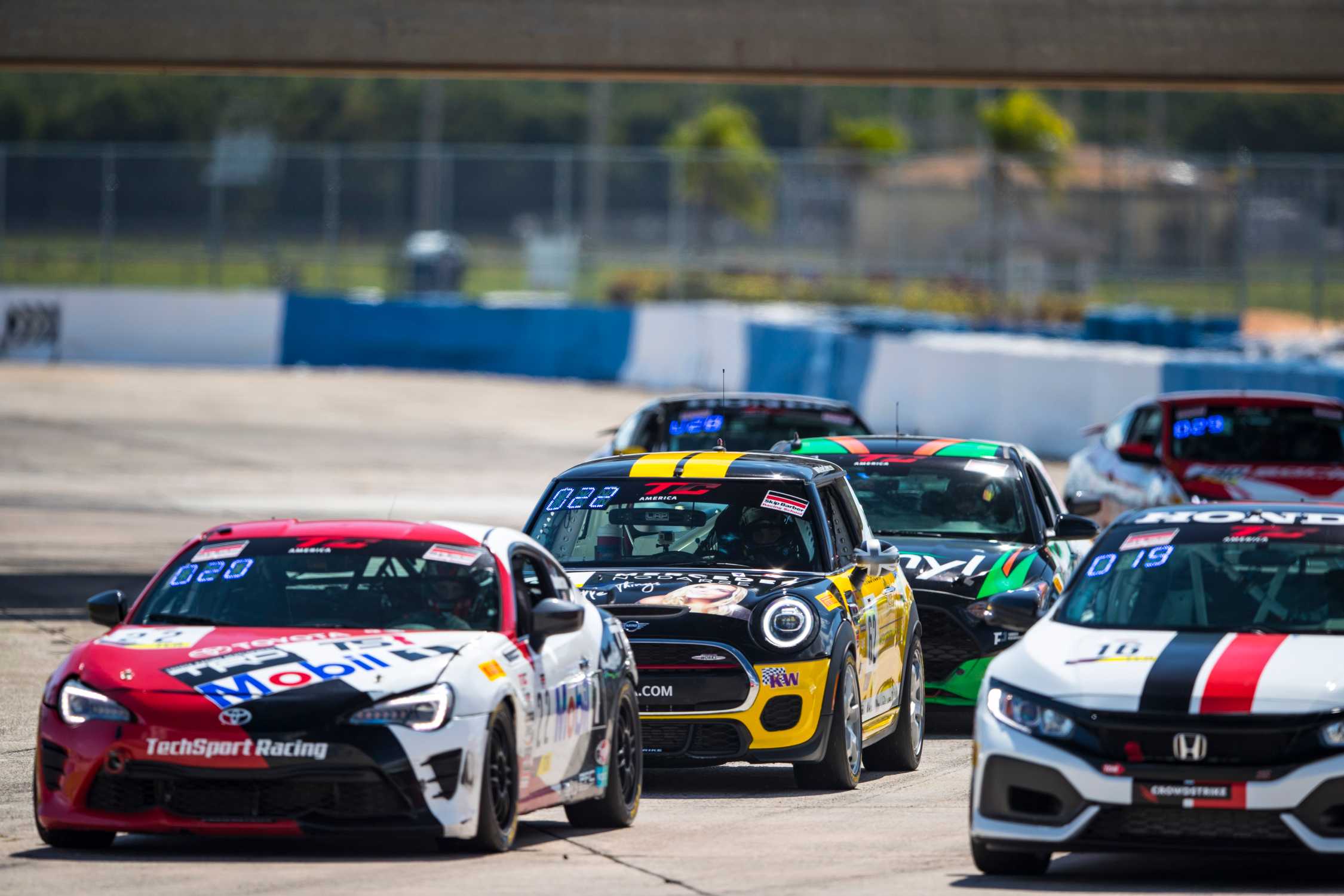 MINI MOTORSPORTS HERITAGE SHOWS UNDERDOG SPIRIT AND DOMINANCE OVER BUSY ...