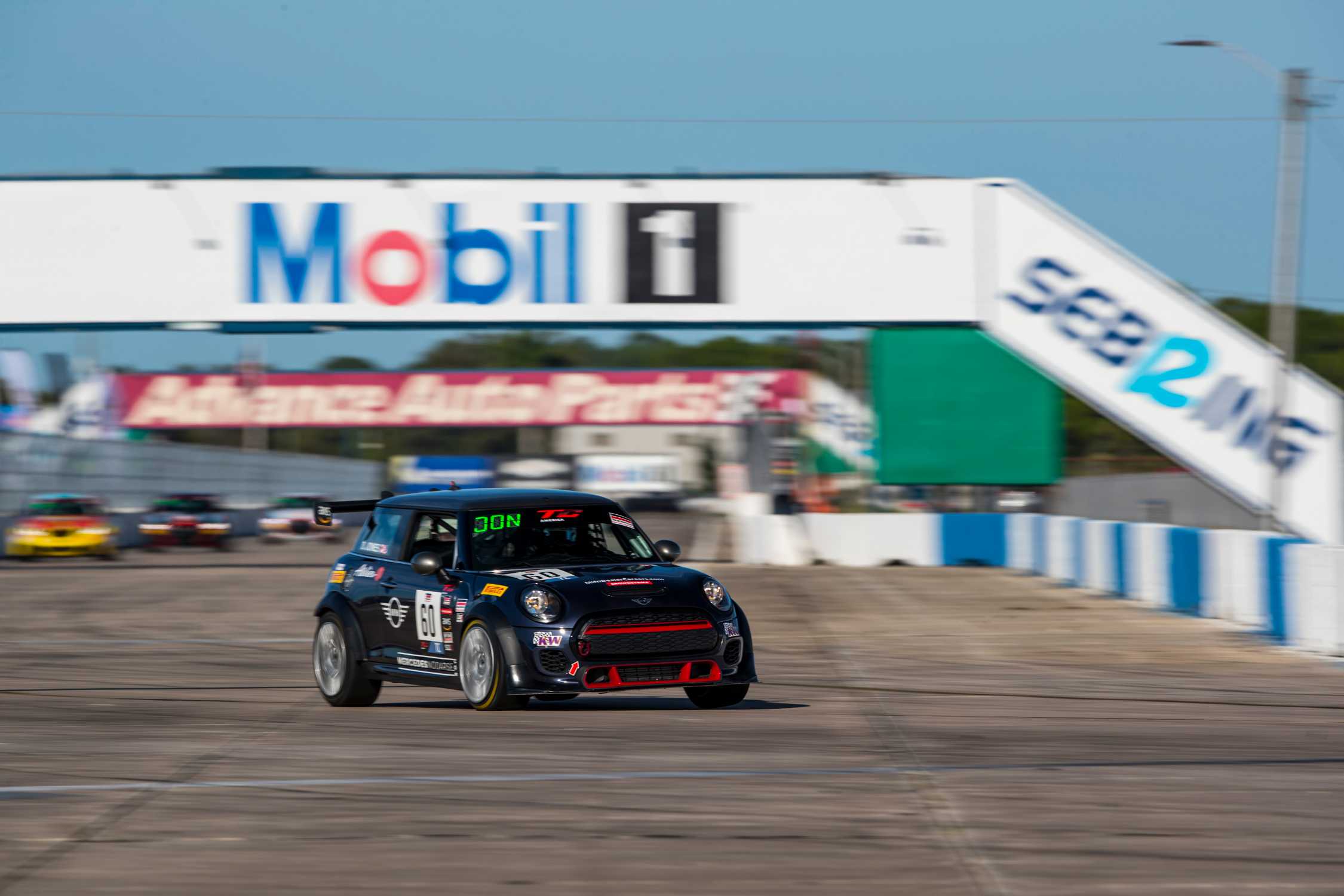 MINI MOTORSPORTS HERITAGE SHOWS UNDERDOG SPIRIT AND DOMINANCE OVER BUSY ...