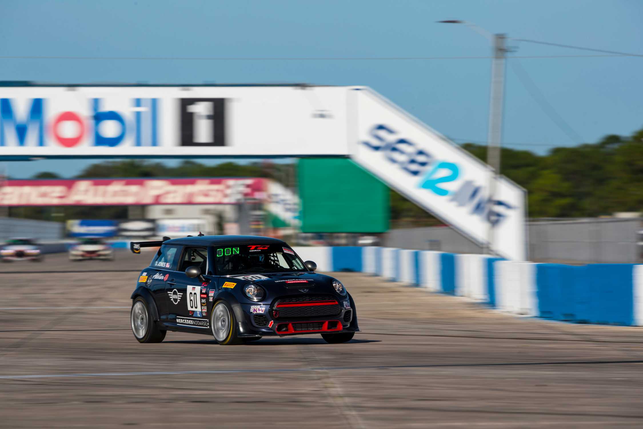 MINI MOTORSPORTS HERITAGE SHOWS UNDERDOG SPIRIT AND DOMINANCE OVER BUSY ...