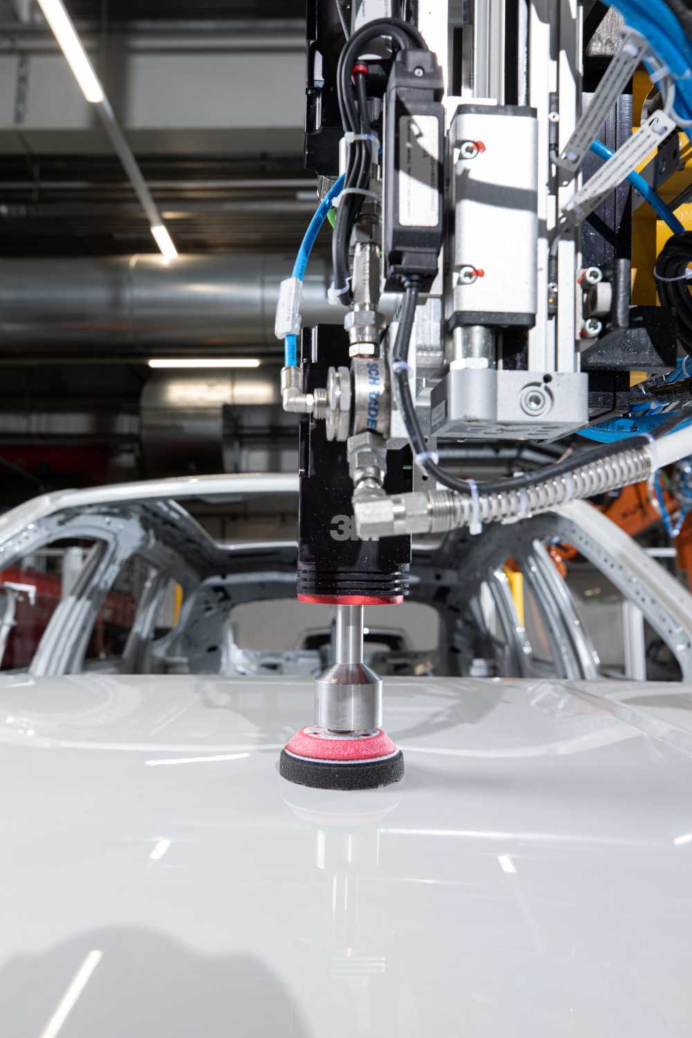 Automated surface processing at BMW Group plant Regensburg: trio of digital paint shop processes ...
